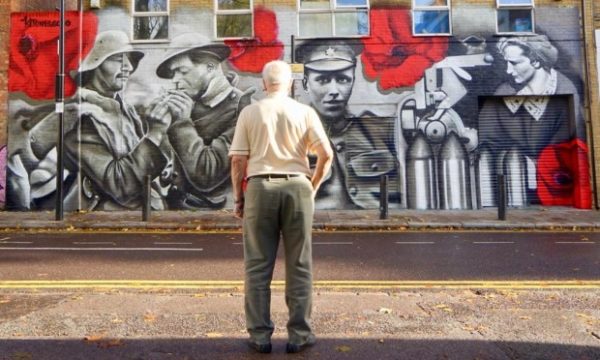 Street artist unveils First World War mural in Shoreditch to mark ...