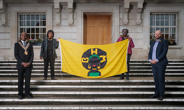 Local politicians lift Black History flag over Hackney Town Hall ...